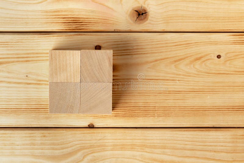 Groupped Wooden Square Blocks on Dark Wooden Table Stock Image - Image ...