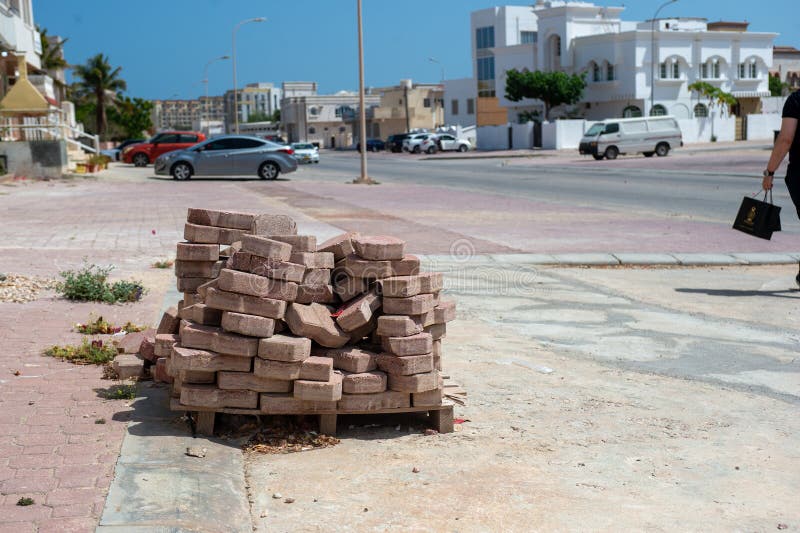 Groups of Bricks in the Street in Salalah, Oman, in Summer at Noon ...