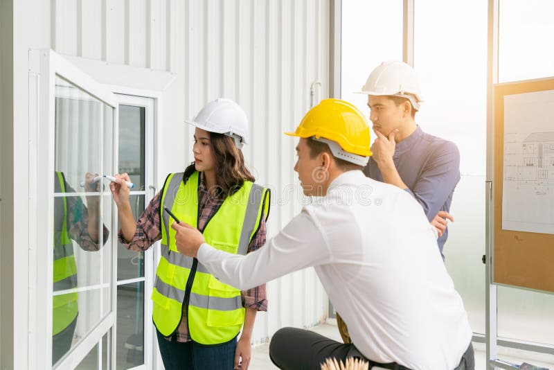 Groups of Construction Engineers Working Together in Workplace Site ...