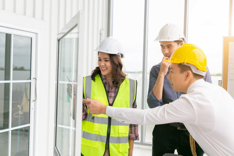 Groups of Construction Engineers Working Together in Workplace Site ...