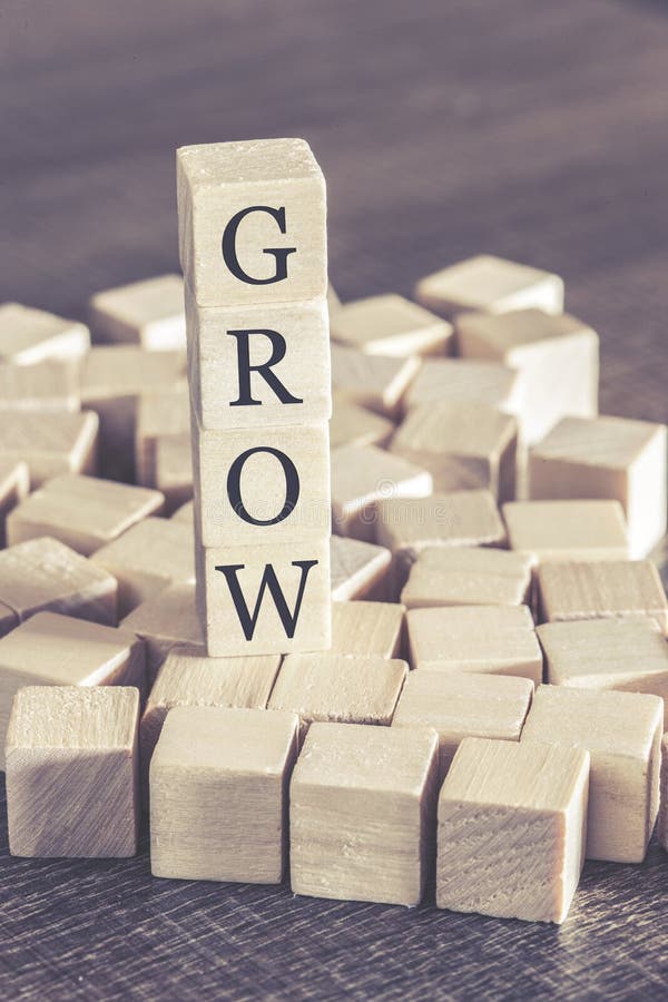 Grow Message Formed with Wooden Blocks Stock Image - Image of ...