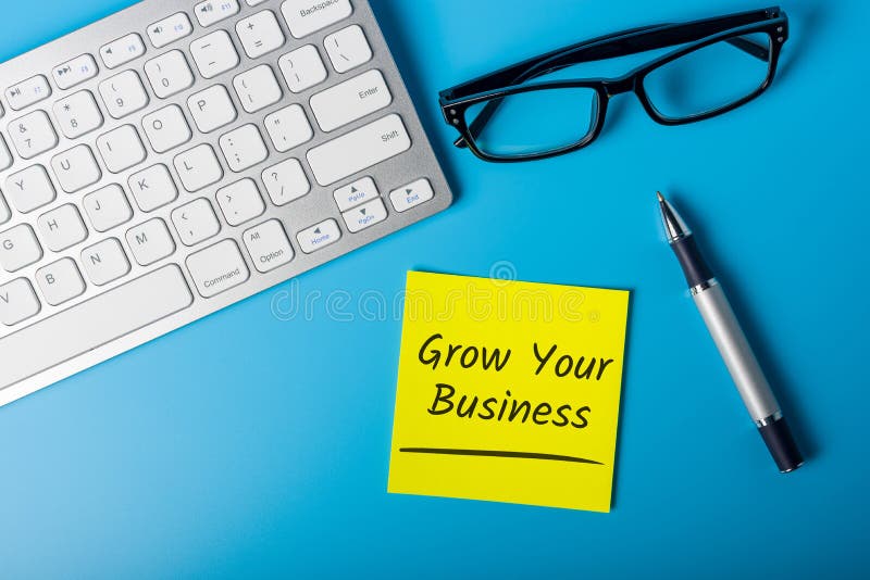 Grow Your Business - Message on Office Workplace Stock Photo - Image of ...
