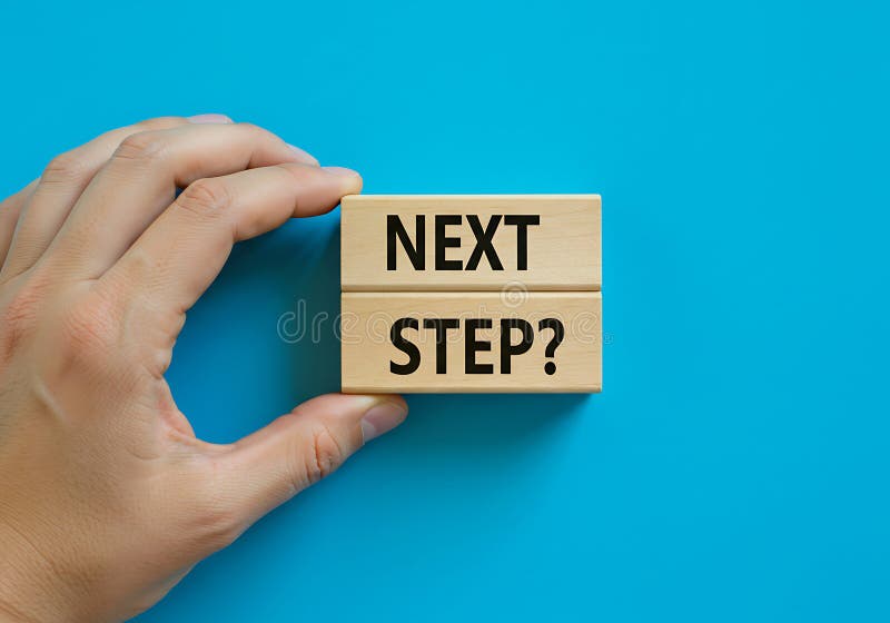 Growth Action Symbolized by Hand Holding Wooden Next Step Block Stock ...