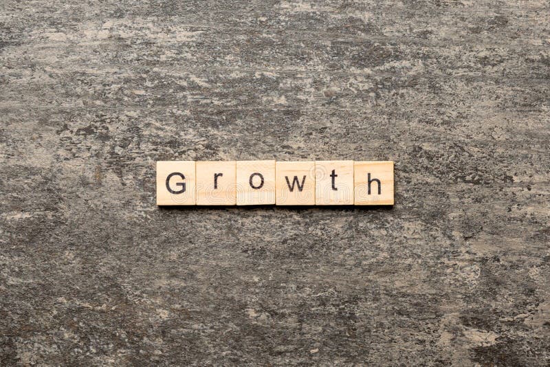 Growth Word Written on Wood Block. Growth Text on Table, Concept Stock ...