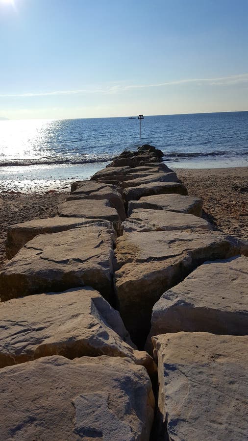 Groyne And Beautiful Sea View Scenery Over Stunning Sunrise Stock Photo ...