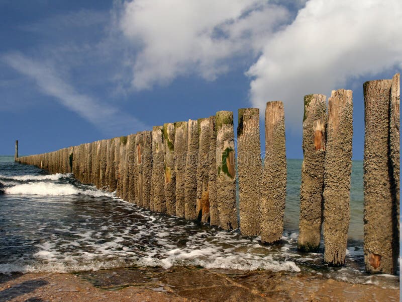 Groynes on beach stock image. Image of sand, travel, groins - 575665