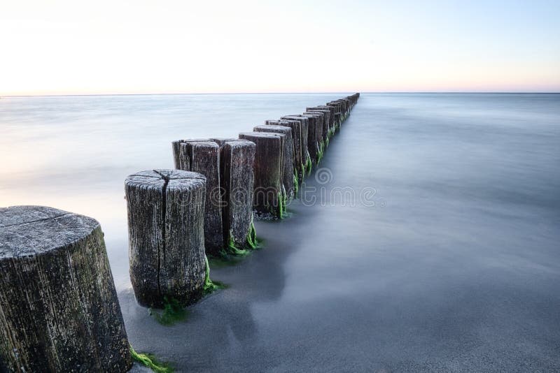 Groynes Jutting into the Sea. Taken in Zingst on the Darss Stock Photo ...