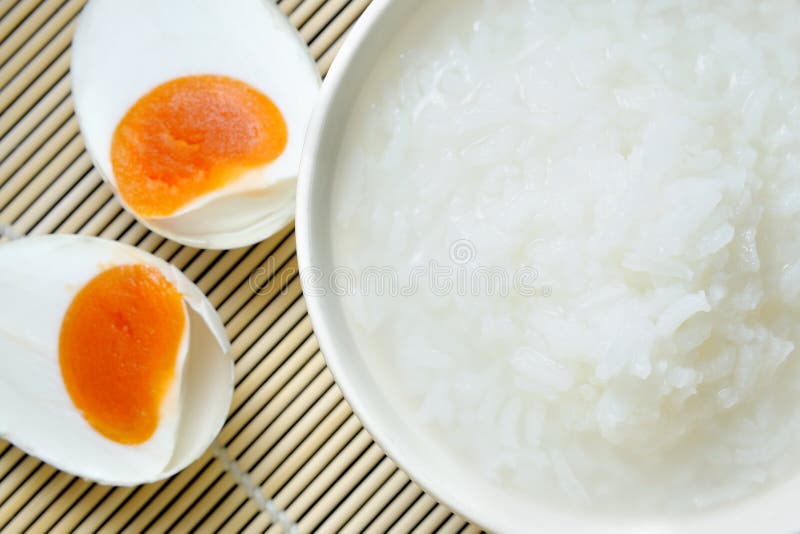 Gruel and salted egg stock image. Image of soft, gruel - 17189595