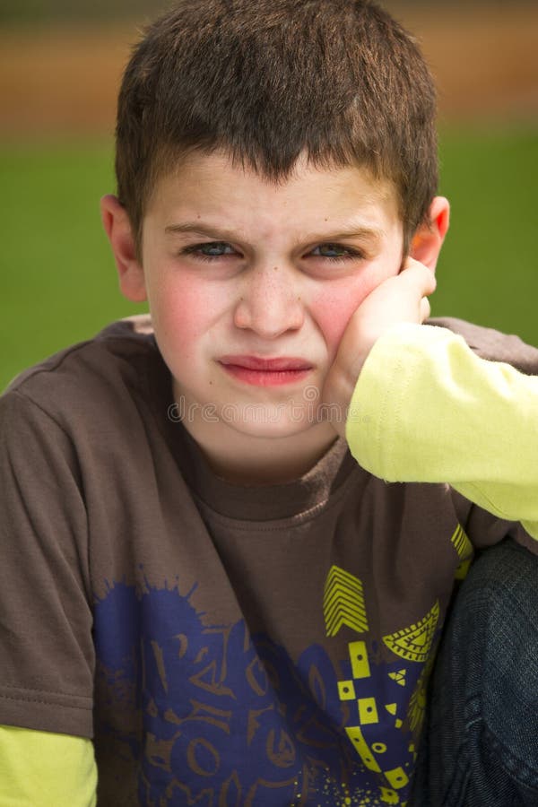 Grumpy Boy stock image. Image of frustrated, anger, expressive - 18556093