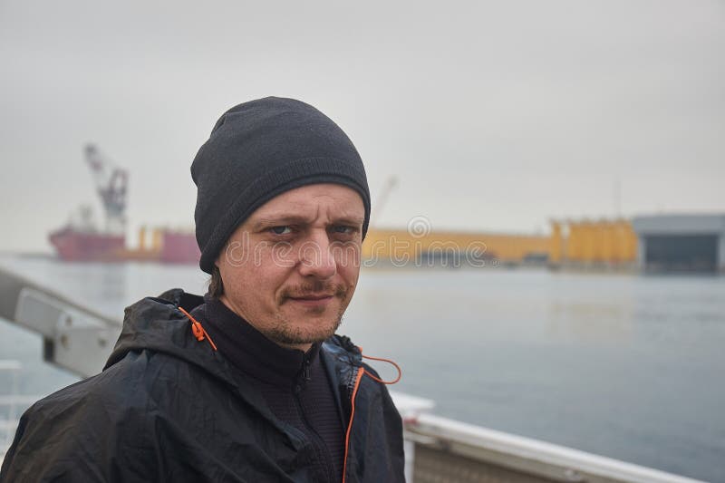 Grumpy Man in an Industrial Harbor Port Stock Image - Image of dock ...