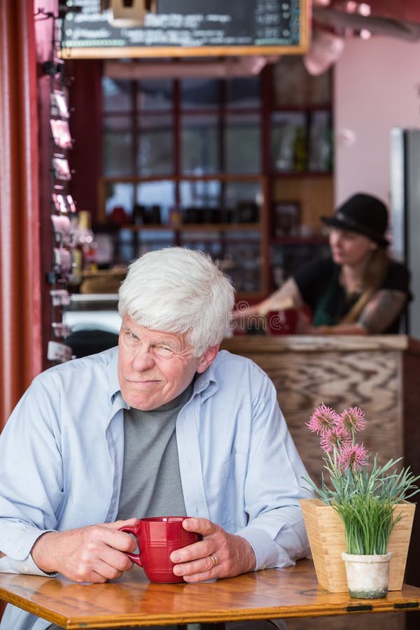 Grumpy Mature Man in Coffee House Stock Image - Image of adult ...