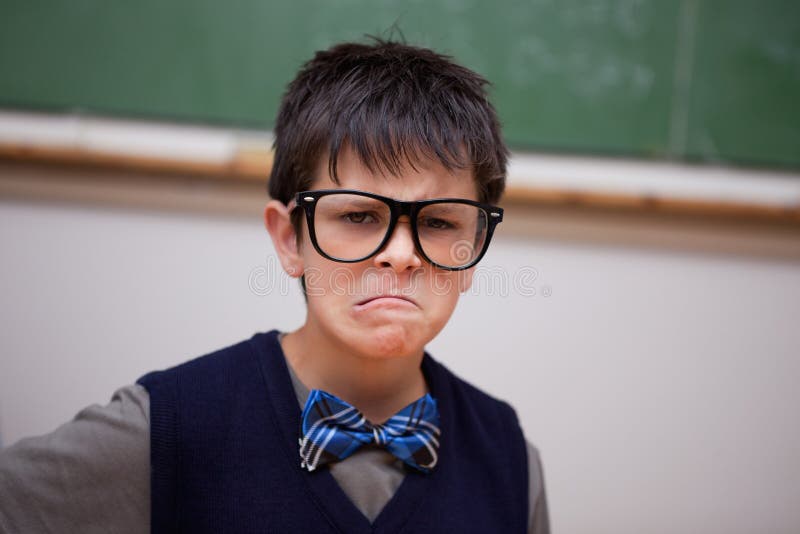 Grumpy schoolboy posing stock image. Image of caucasian - 22692525