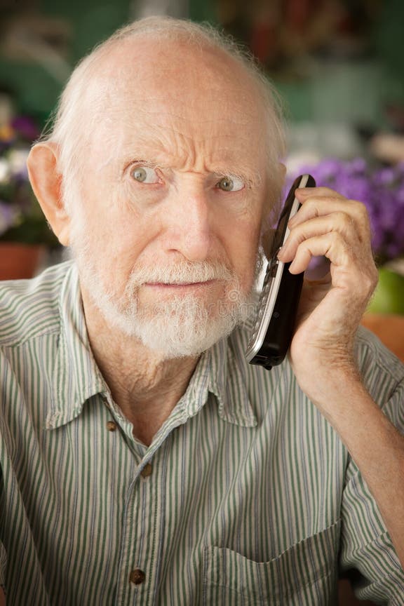Grumpy Senior Man on Telephone Stock Image - Image of interruption ...