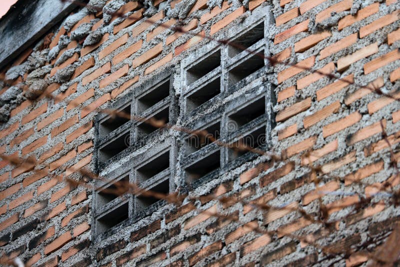 Grunge Cement Window through Barbed Wire Stock Image - Image of opening ...