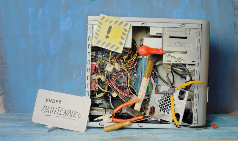 Grungy Demolished Computer with Maintenance Sign,service Not Available ...