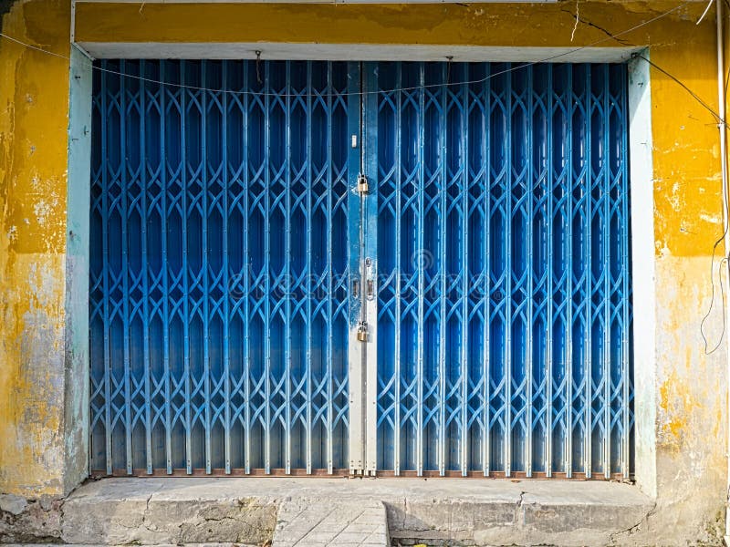 Grungy Rusty Blue and Yellow Metal Gate Stock Photo - Image of blue ...