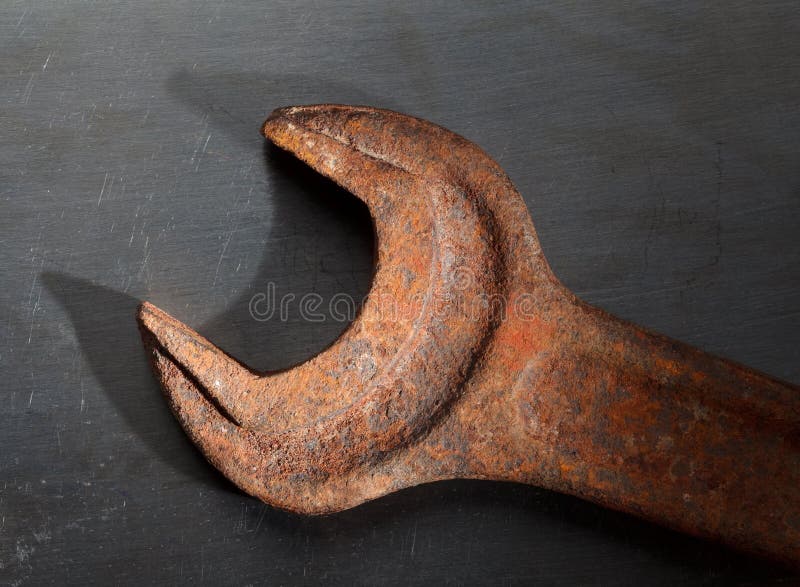 Rusted Wrench Over Corroded Iron Plate Stock Photo - Image of brown ...