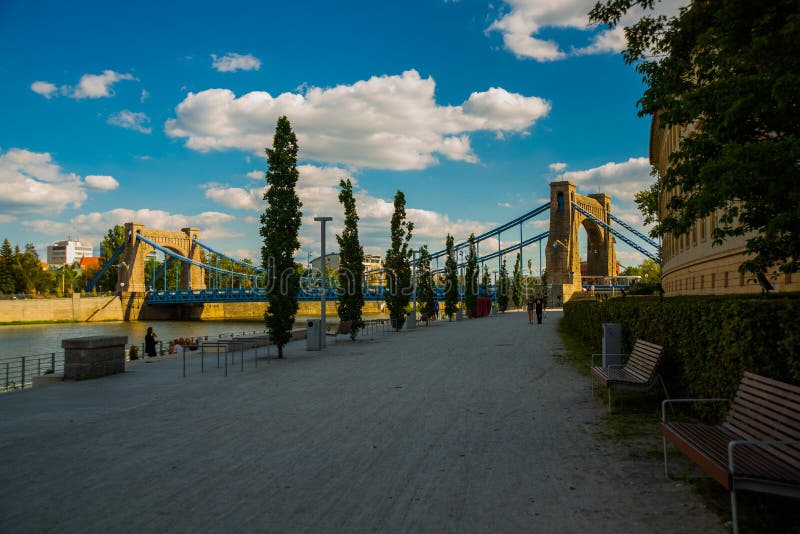 Grunwald Bridge in Wroclaw, Poland. and a Bout on the River Odra Stock ...