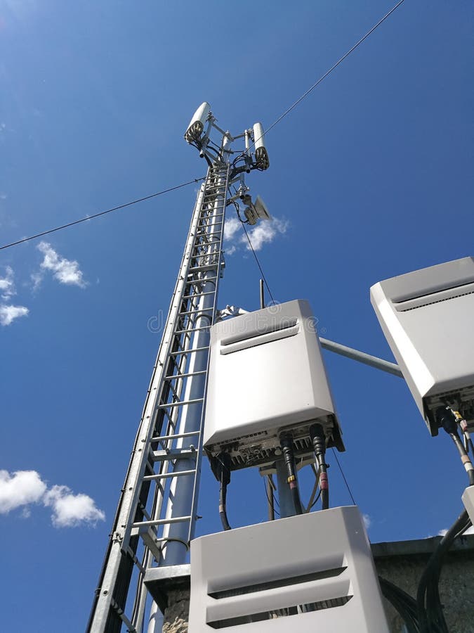 GSM Base Station Antenna in Front of Blue Cloudy Sky Stock Image ...