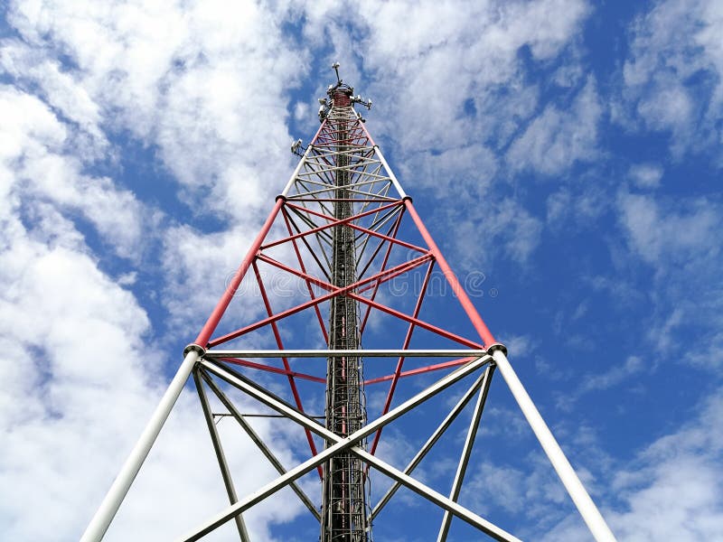 GSM Repeater Tower in Front of Blue Cloudy Sky Stock Image - Image of ...