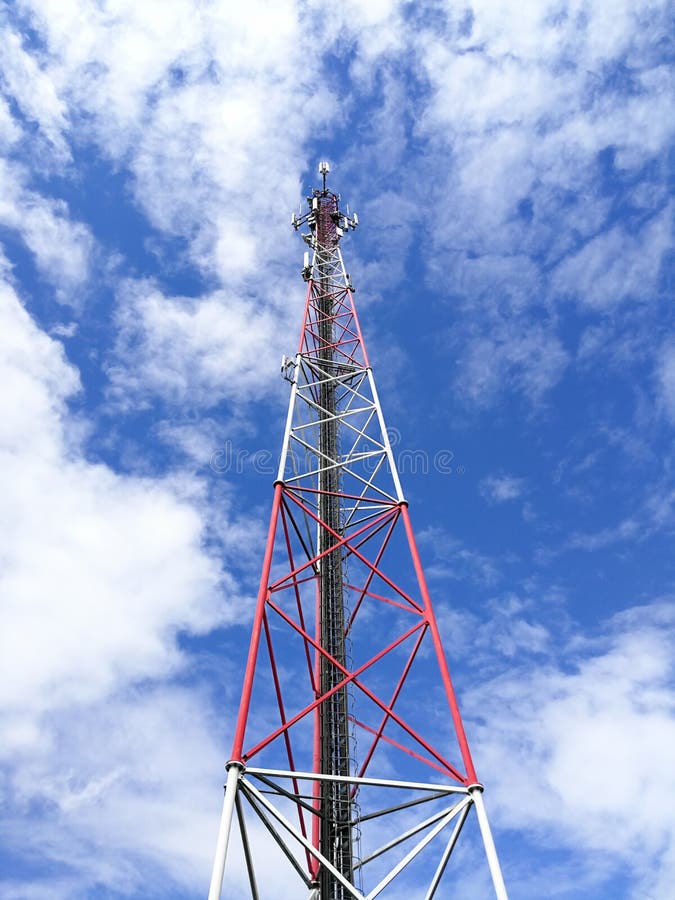 GSM Repeater Tower In Front Of Blue Cloudy Sky Stock Photo - Image of ...