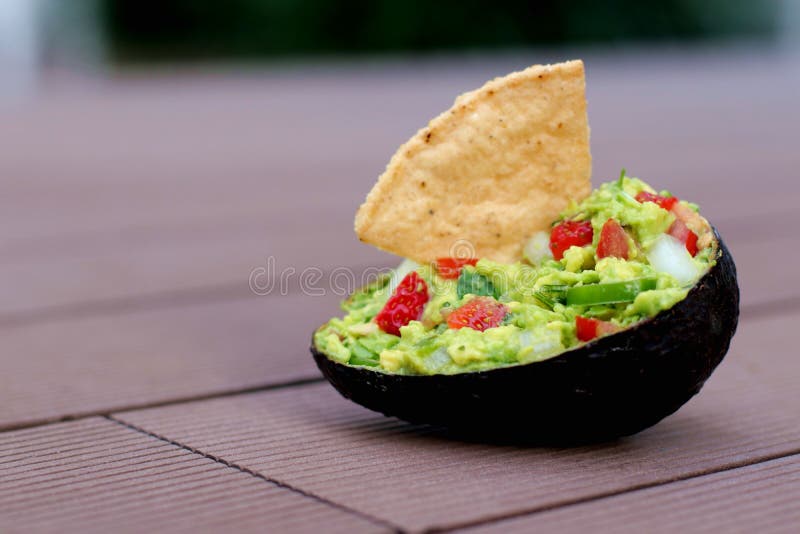 Guacamole Inside an Avocado Stock Image - Image of crisp, dipping ...