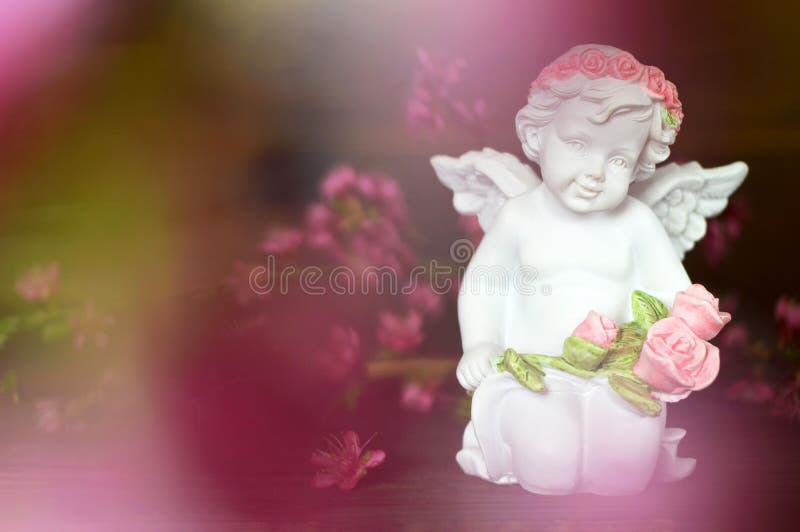 Guardian Angel Holding Flowers Stock Photo - Image of grave, card ...