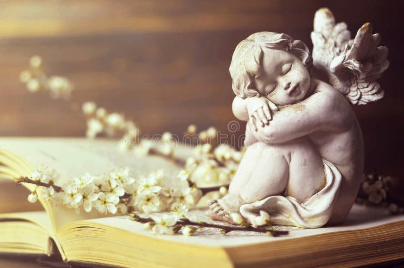 Guardian Angel and Spring Branches on the Book Stock Photo - Image of ...