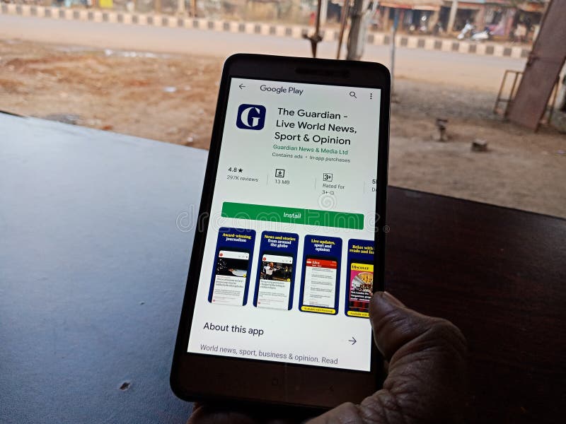 The Guardian App Software Application Presented on Digital Screen at ...