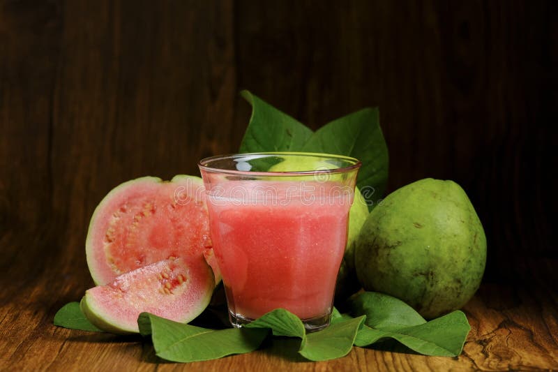 Guava Juice is Served on a Wooden Background Stock Image - Image of ...