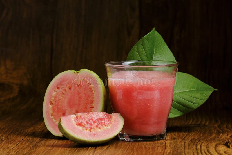 Guava Juice is Served on a Wooden Background Stock Photo - Image of ...