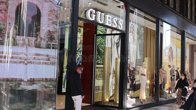 MILAN, ITALY - October 22, 2022: Guess Store. People Walk by the Guess ...