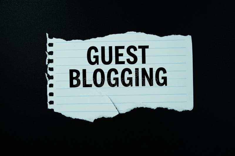 Guest Blogging Text Written on Paper Torn Top View on Black Background ...