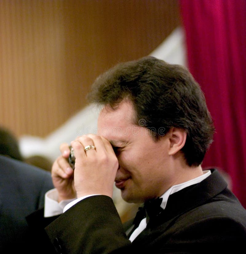 Guest with a camera stock photo. Image of tuxedo, reception - 64210