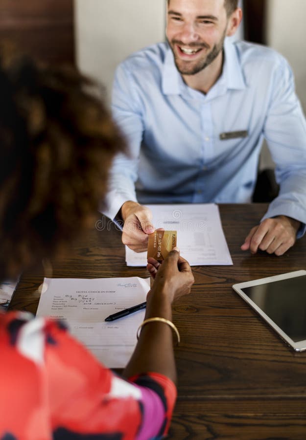Guests Checking in To a Hotel Stock Image - Image of office, reception ...