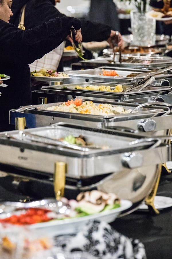 Guests at a Food Buffet editorial stock photo. Image of event - 113188173
