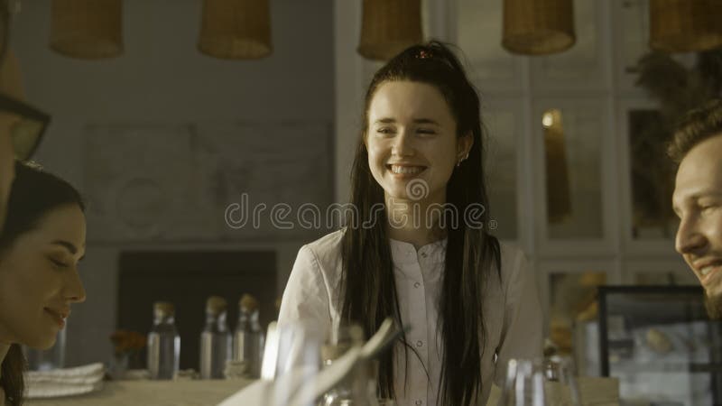 Guests Watching Menu, Talking with Female Worker Stock Photo - Image of ...