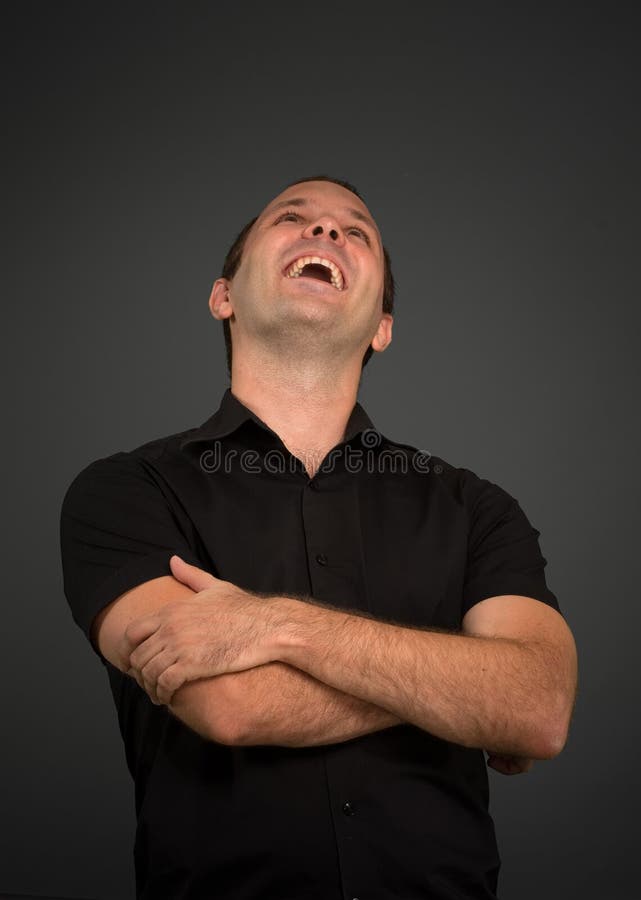 Guffawing man in black stock image. Image of happy, smiling - 22426271