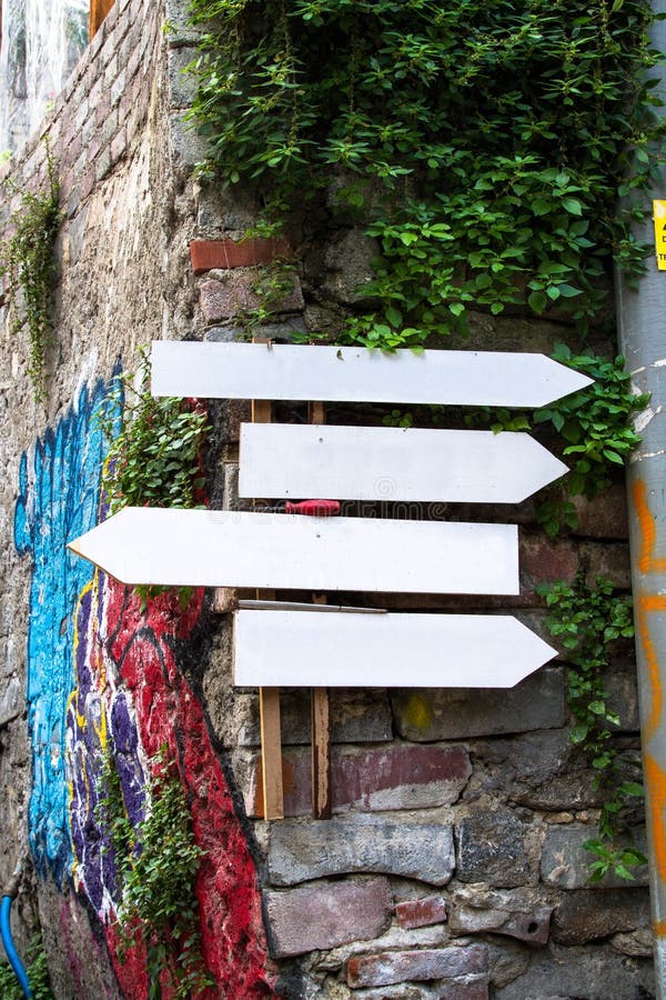 The Guide-board with Four Directions Stock Photo - Image of contrasts ...