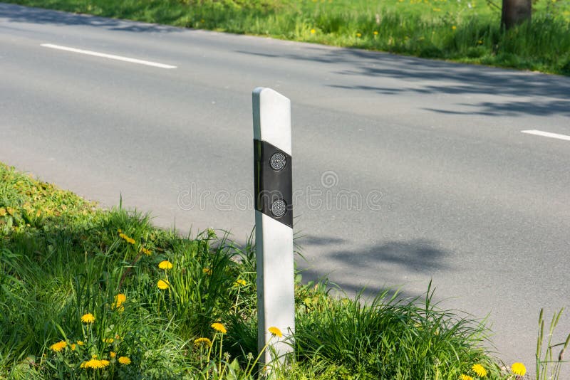 Guide post stock image. Image of street, plant, safty - 24795265