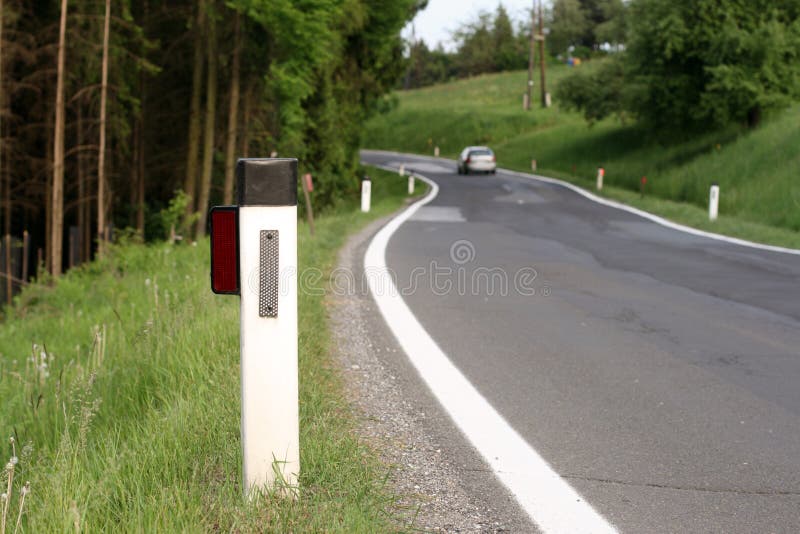 Guide Post on a Country Road Stock Image - Image of roadside, road: 9316849