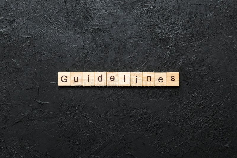 Guidelines Word Written on Wood Block. Guidelines Text on Table ...