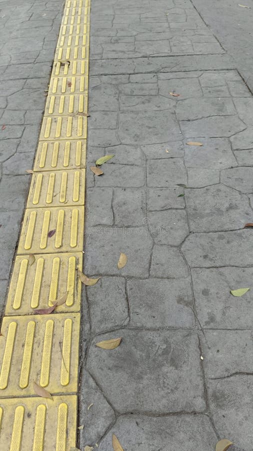 Guiding Block Installed on the Sidewalk Stock Image - Image of flooring ...