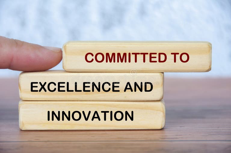 A Guiding Finger Presses Forward the Idea of Commitment To Excellence and Innovation ...