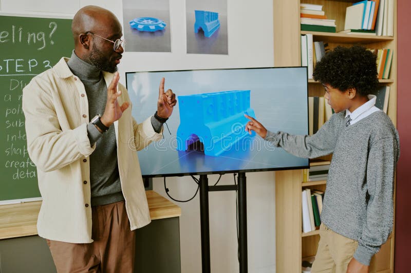 Guiding Student in 3D Modeling Instruction Session Stock Image - Image ...
