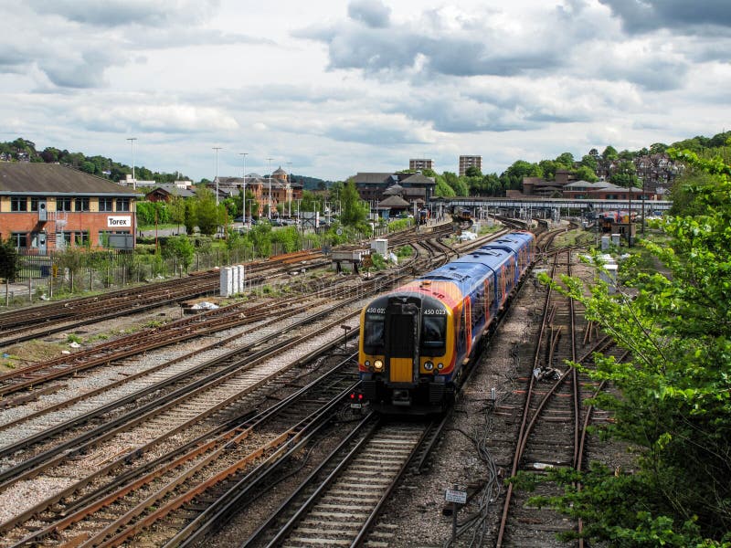 Guildford rail tracks editorial photo. Image of tree - 64417471