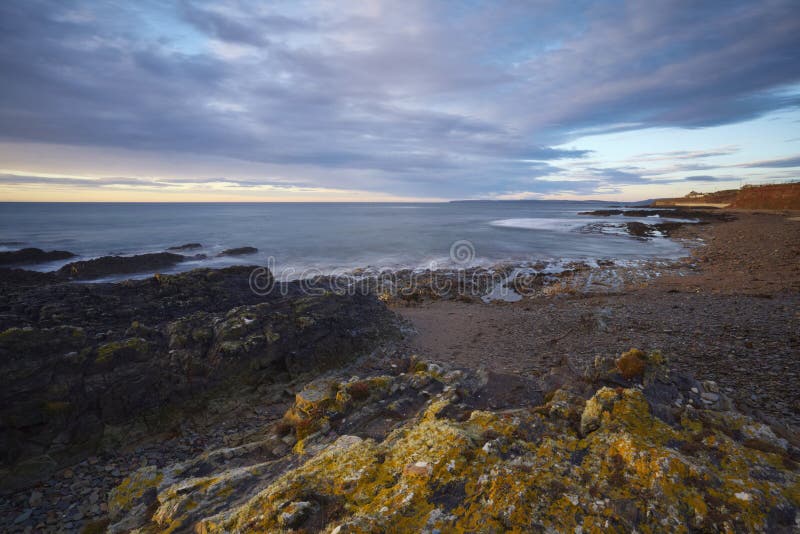 Guileen Strand stock photo. Image of shore, sunny, rock - 13091340