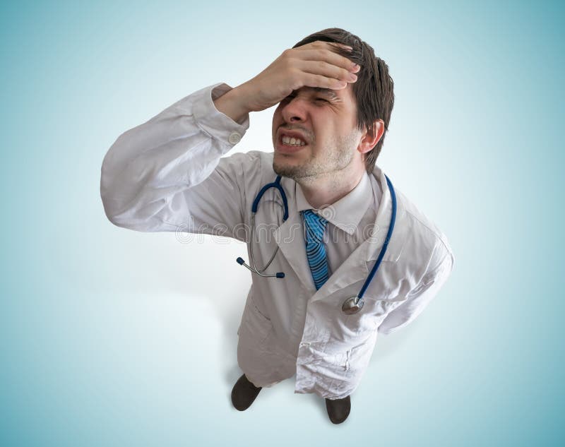 Guilt Stressed and Disappointed Doctor. View from Top Stock Photo ...
