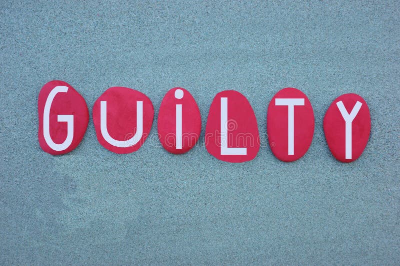 Guilty Word Composed with Red Stone Letters Over Green Sand Stock ...