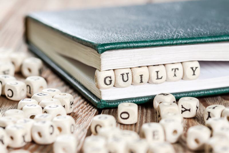 Word GUILTY on Old Wooden Table. Stock Photo - Image of judge, abstract ...